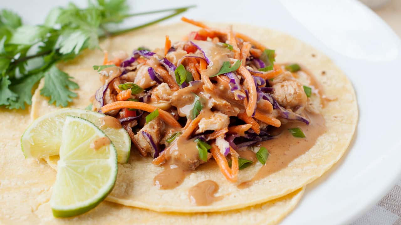 Slow Cooker Thai Chicken Tacos with Peanut Sauce
